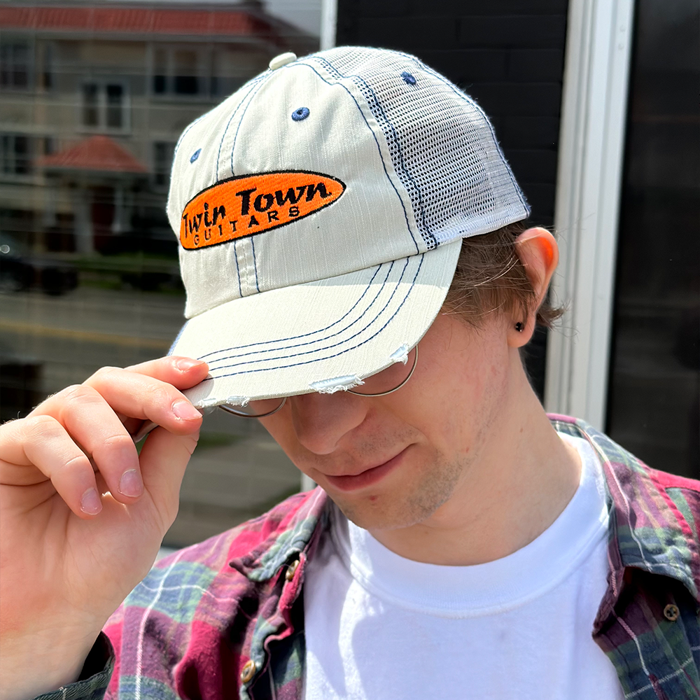 Twin Town Guitars Distressed Baseball Cap with Embroidered Orange Logo